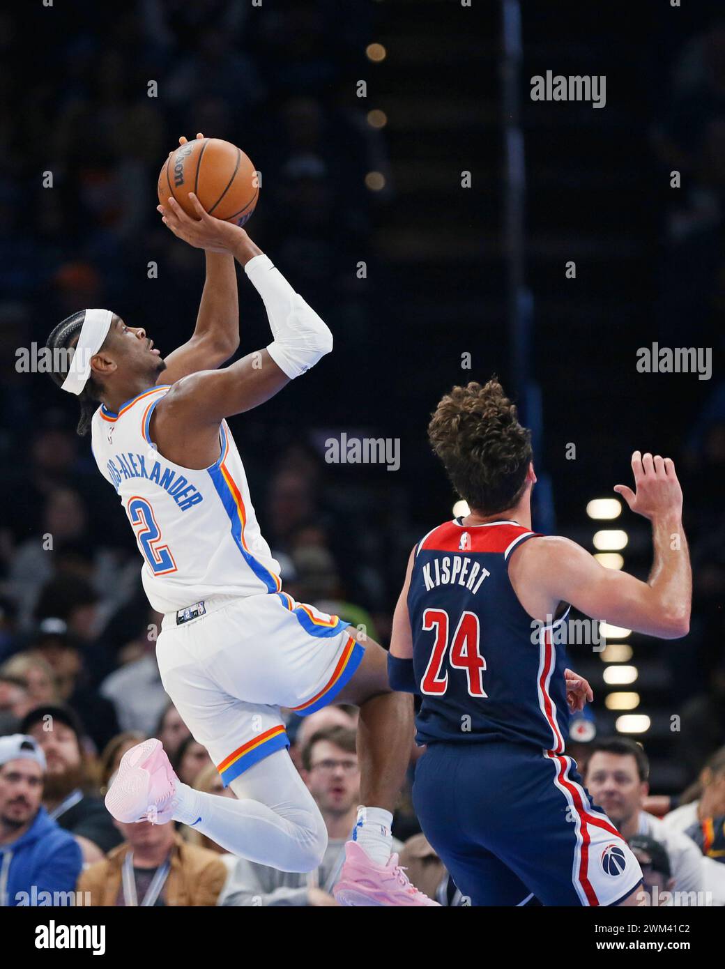 Oklahoma City Thunder guard Shai Gilgeous-Alexander prepares to shoot next to Washington Wizards ...