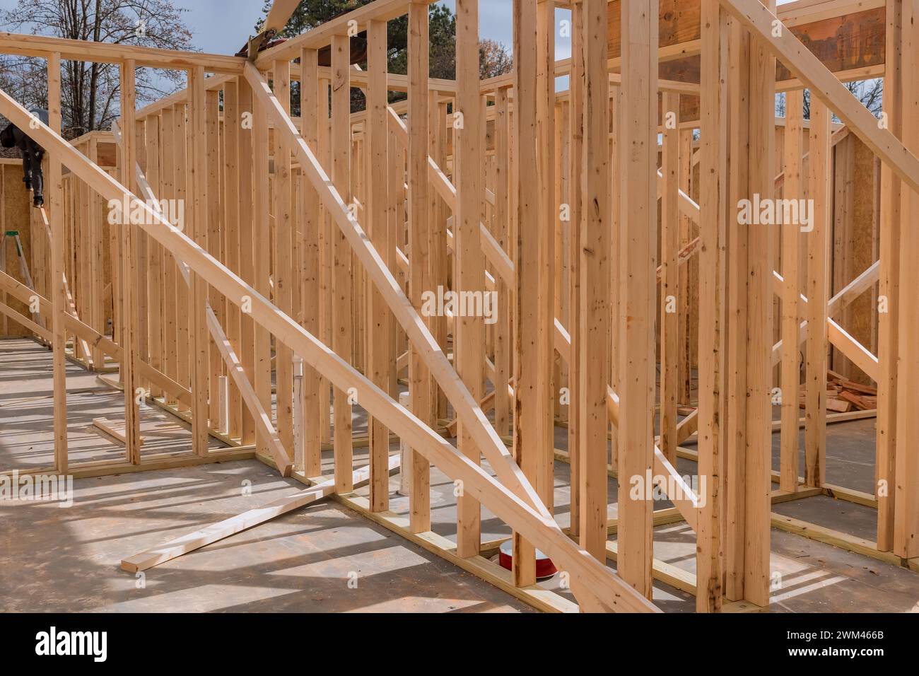 During building construction, new home frame stick beams wood framing ...