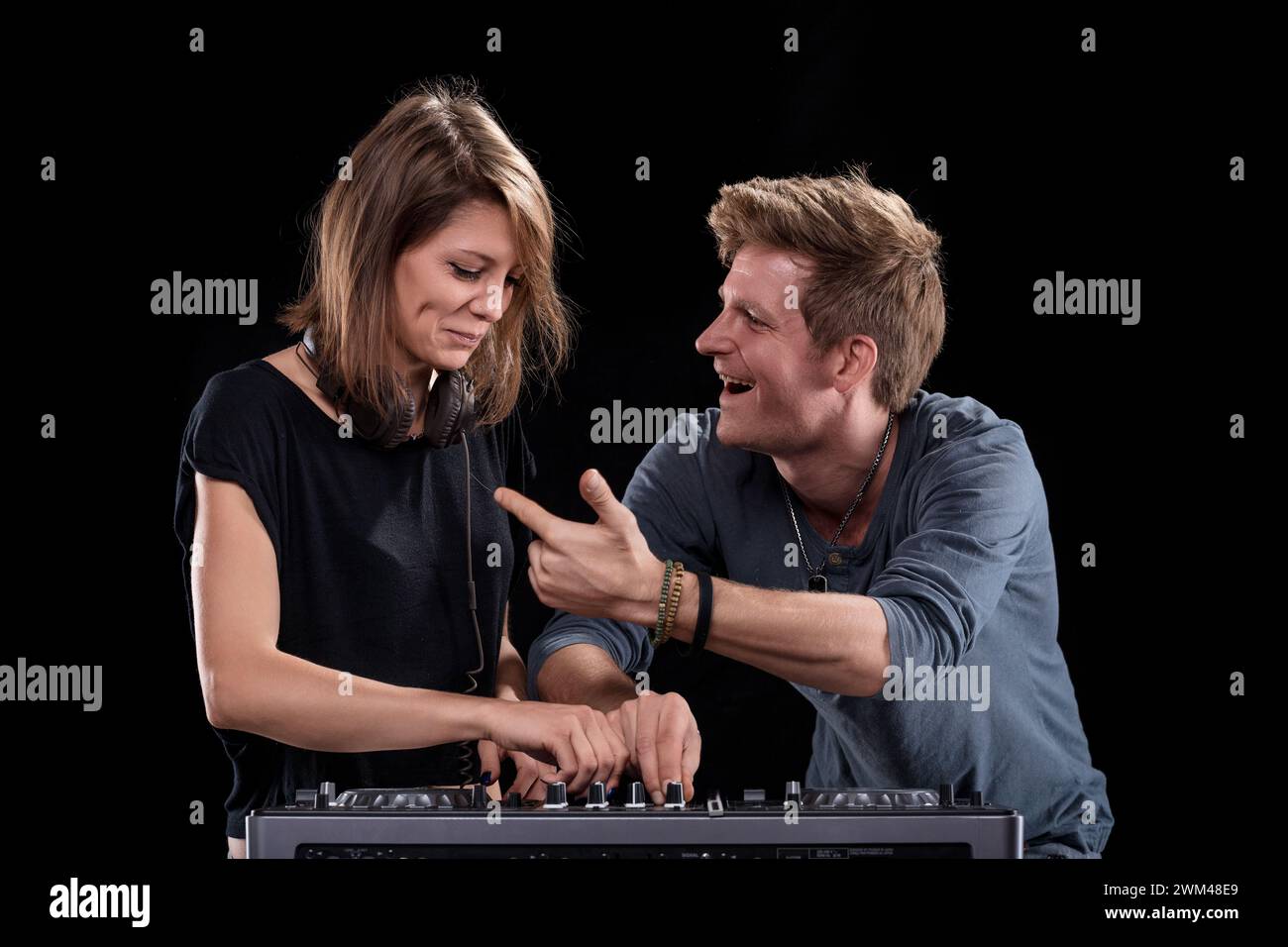 The male DJ's enthusiasm is infectious, drawing a smile from the female ...