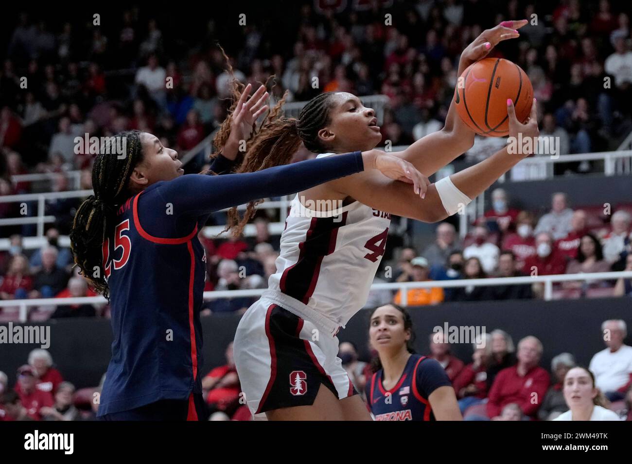 Arizona forward Breya Cunningham, left, fouls Stanford forward Kiki ...