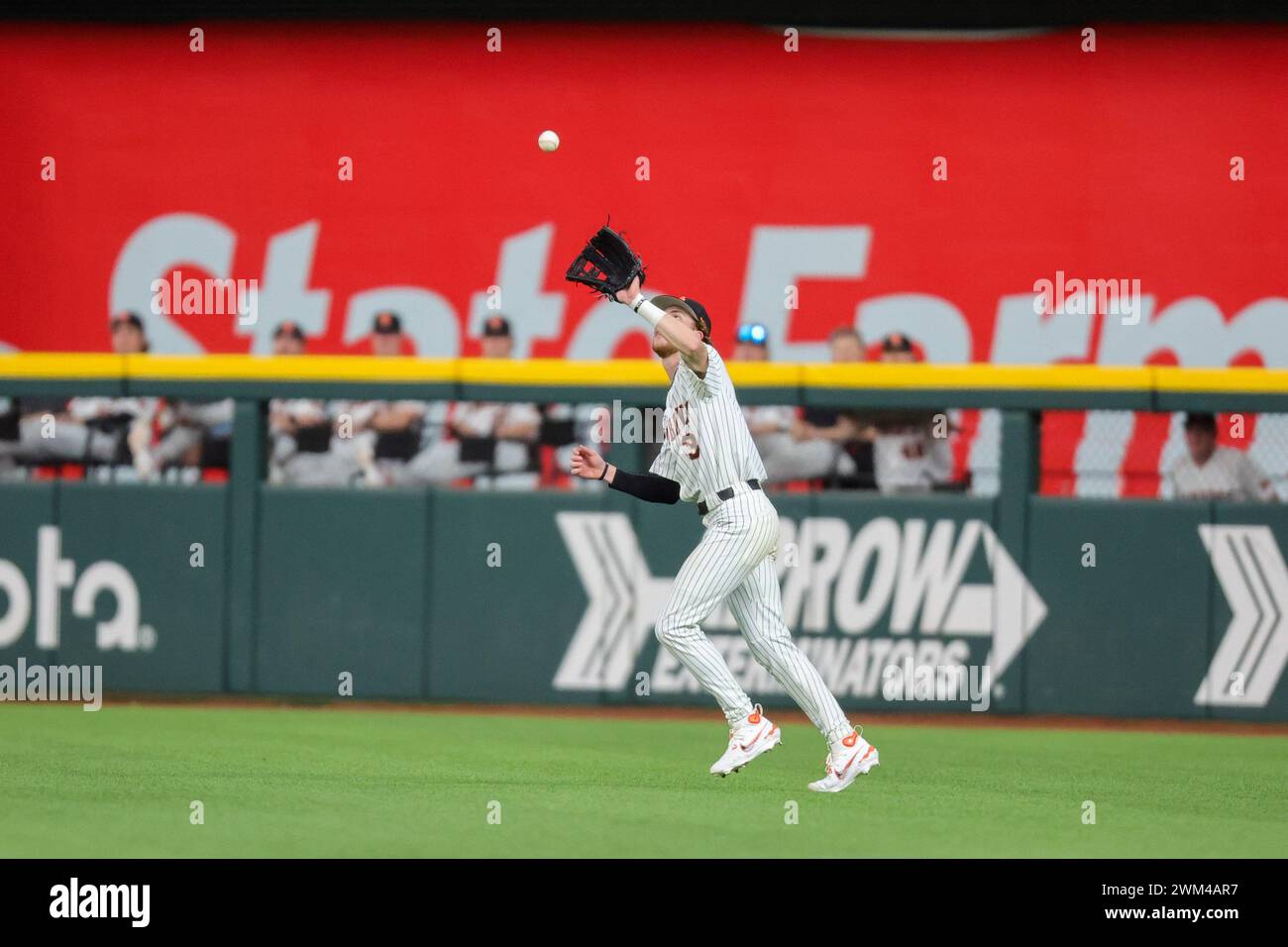 February 23, 2024: Oklahoma State outfielder Carson Benge #3 moves to ...