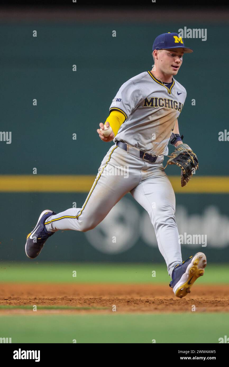 February 23, 2024: Dylan Stanton #9 Wolverines first baseman motions to ...