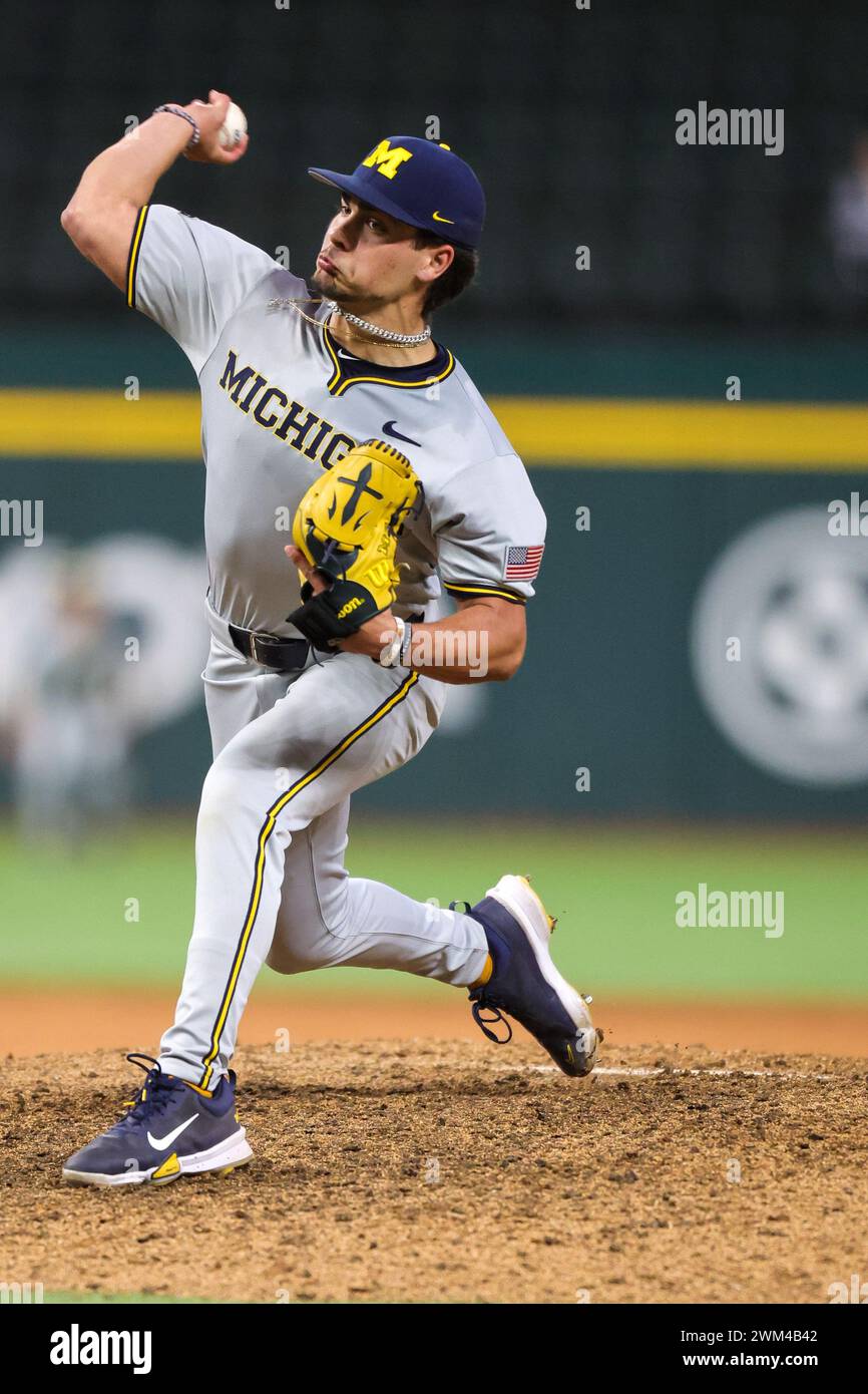February 23, 2024: Sachem Ramos #12 Wolverines pitcher works from the ...