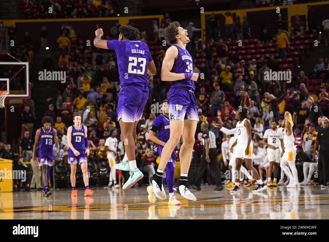 Washington Huskies center Braxton Meah (34) celebrates with guard ...