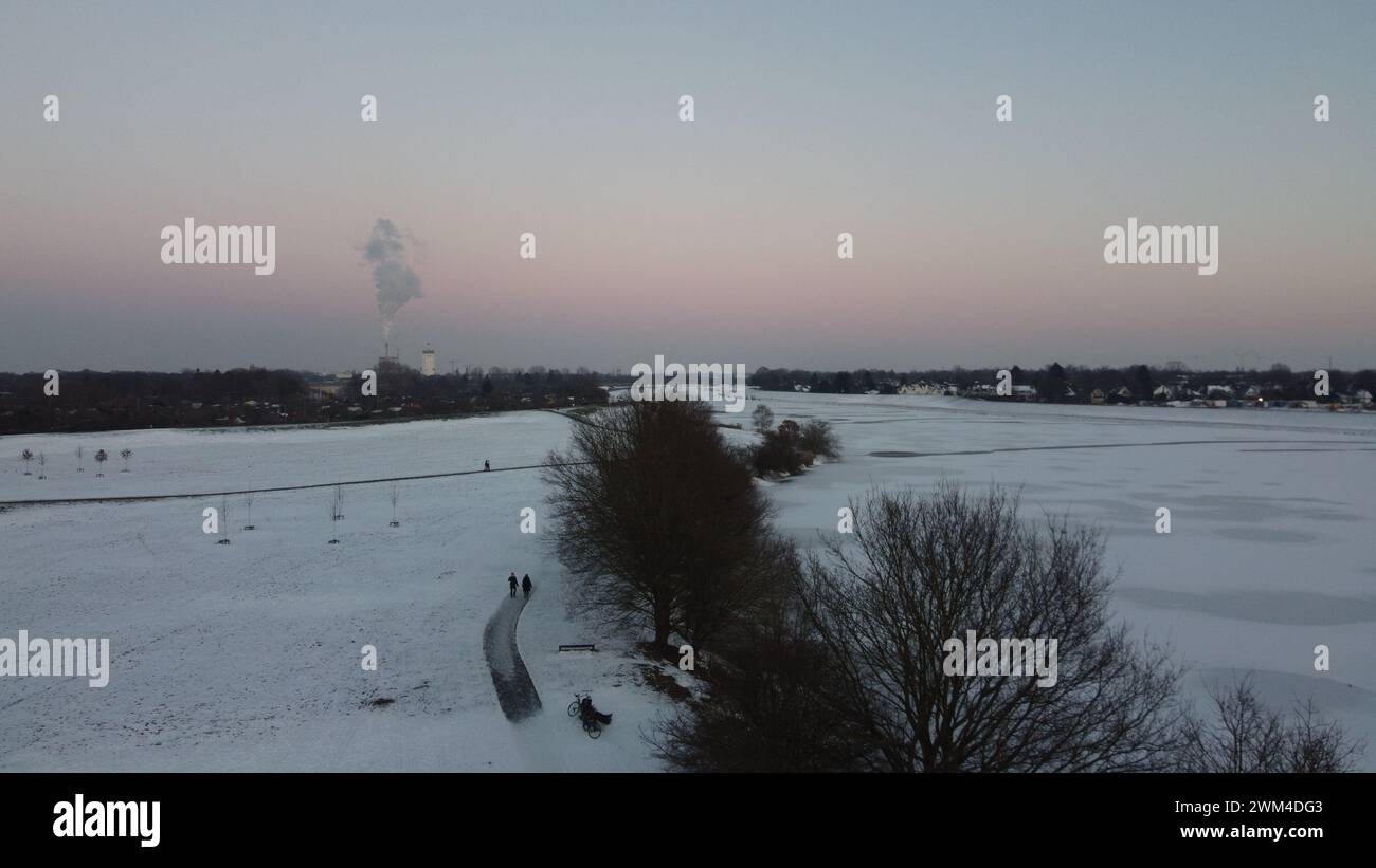 Werdersee, Bremen, Germany. Drone shot. The lake is frozen, on the ...