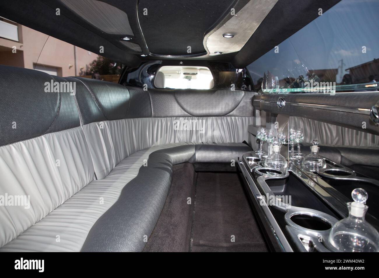 empty limo interior with drink and glasses Stock Photo - Alamy