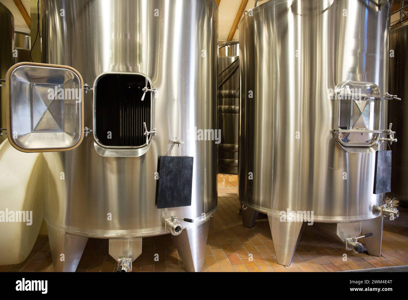 Steel barrels for fermentation of wine in winemaker factory Stock Photo ...
