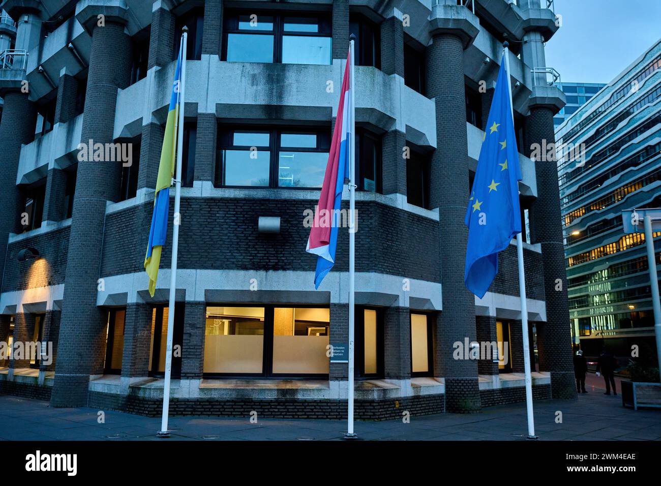 THE HAGUE - The Ukrainian flag is hoisted in front of the House of ...