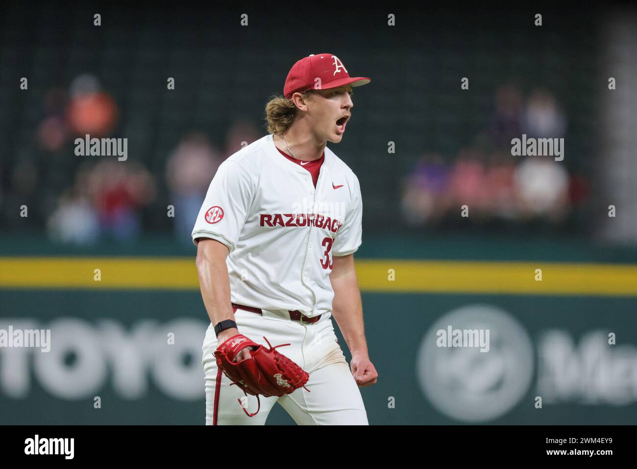 February 23, 2024: Hagen Smith #33 Arkansas pitcher shows some emotion ...