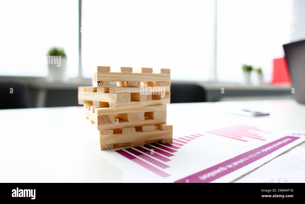 pallets tower lie on table charts with Stock Photo - Alamy
