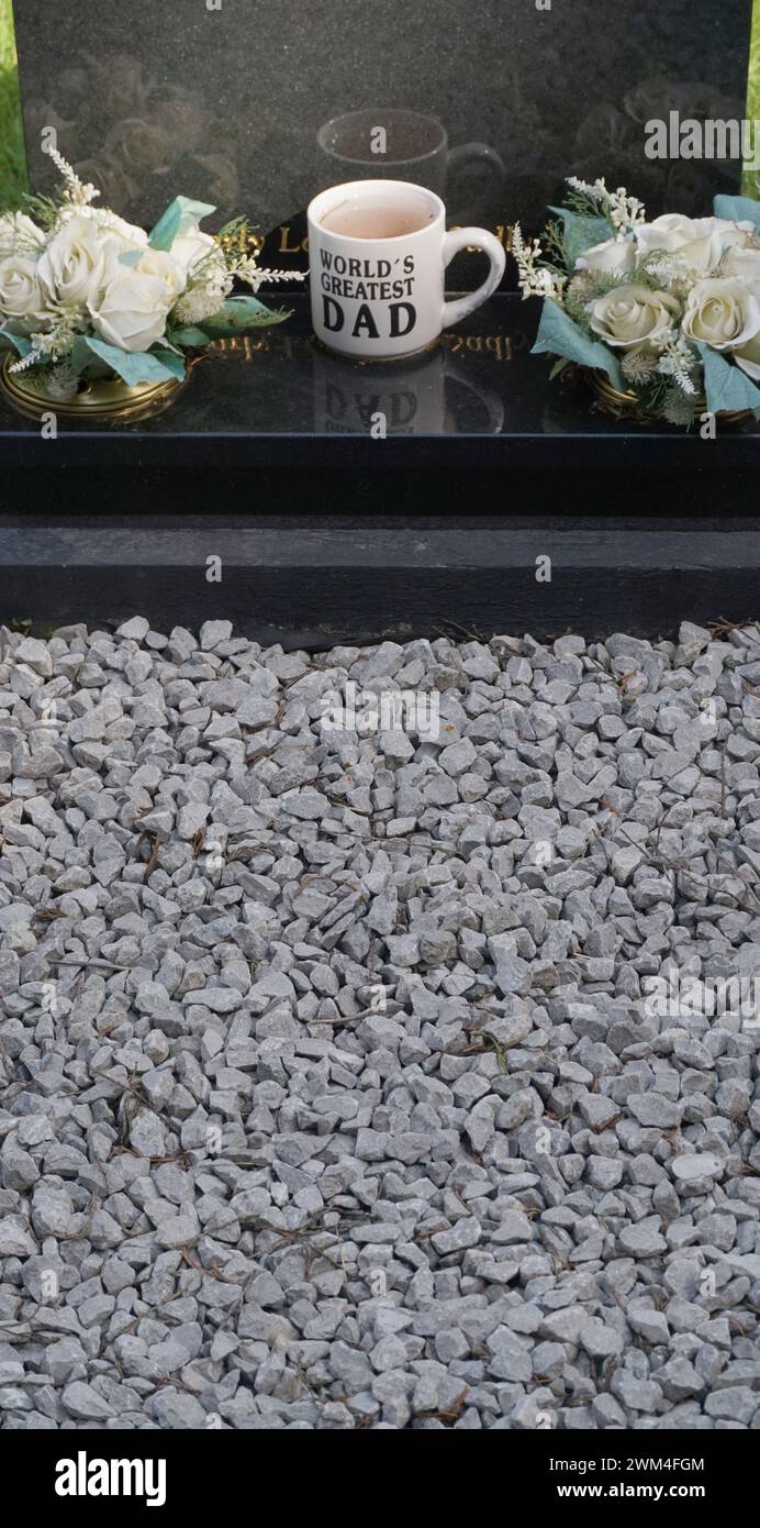 World's Greatest Dad, ceramic mug with coffee stains in left as a ...