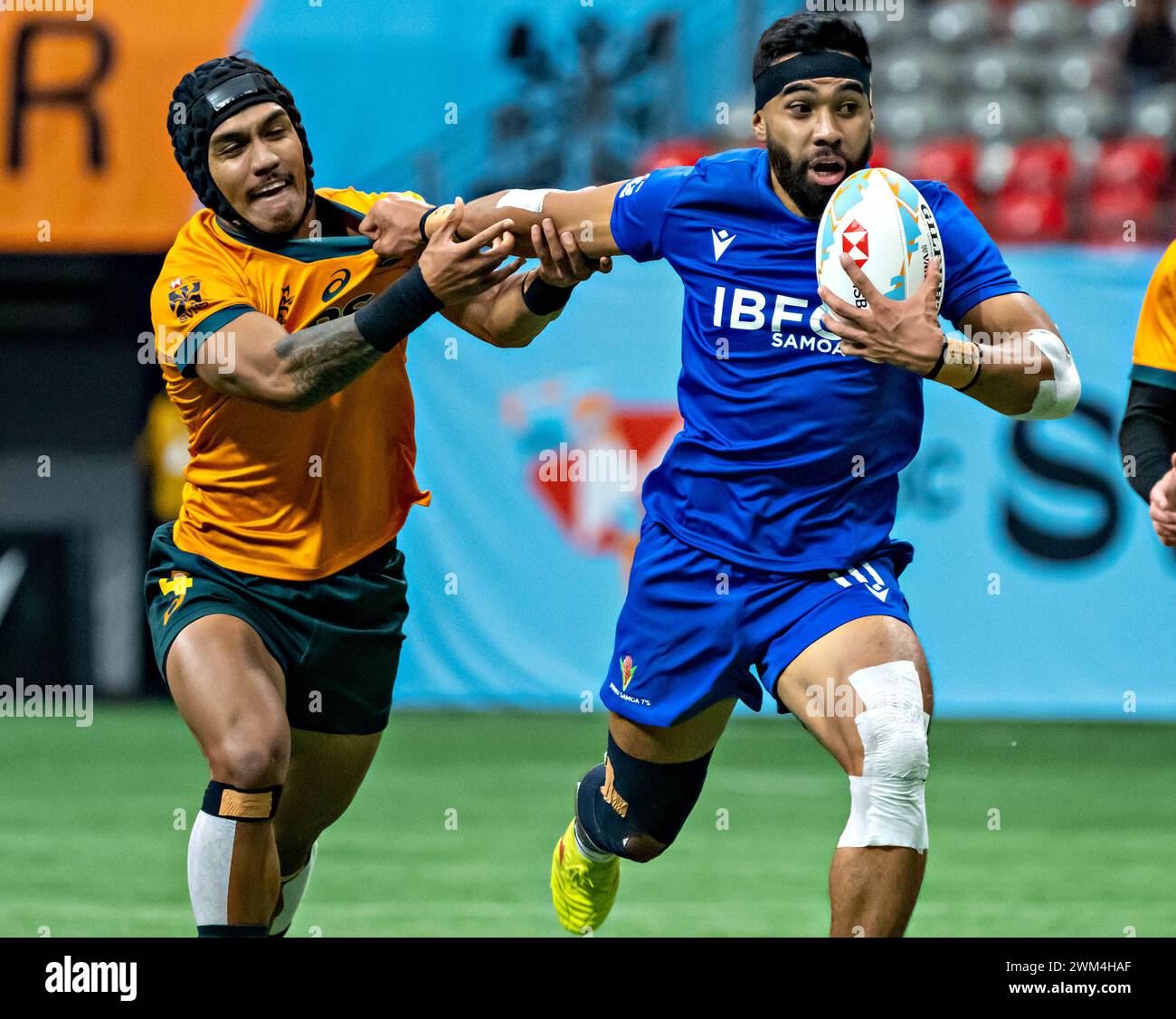 Vancouver. 23rd Feb, 2024. Dietrich Roach of Australia (L) vies with ...