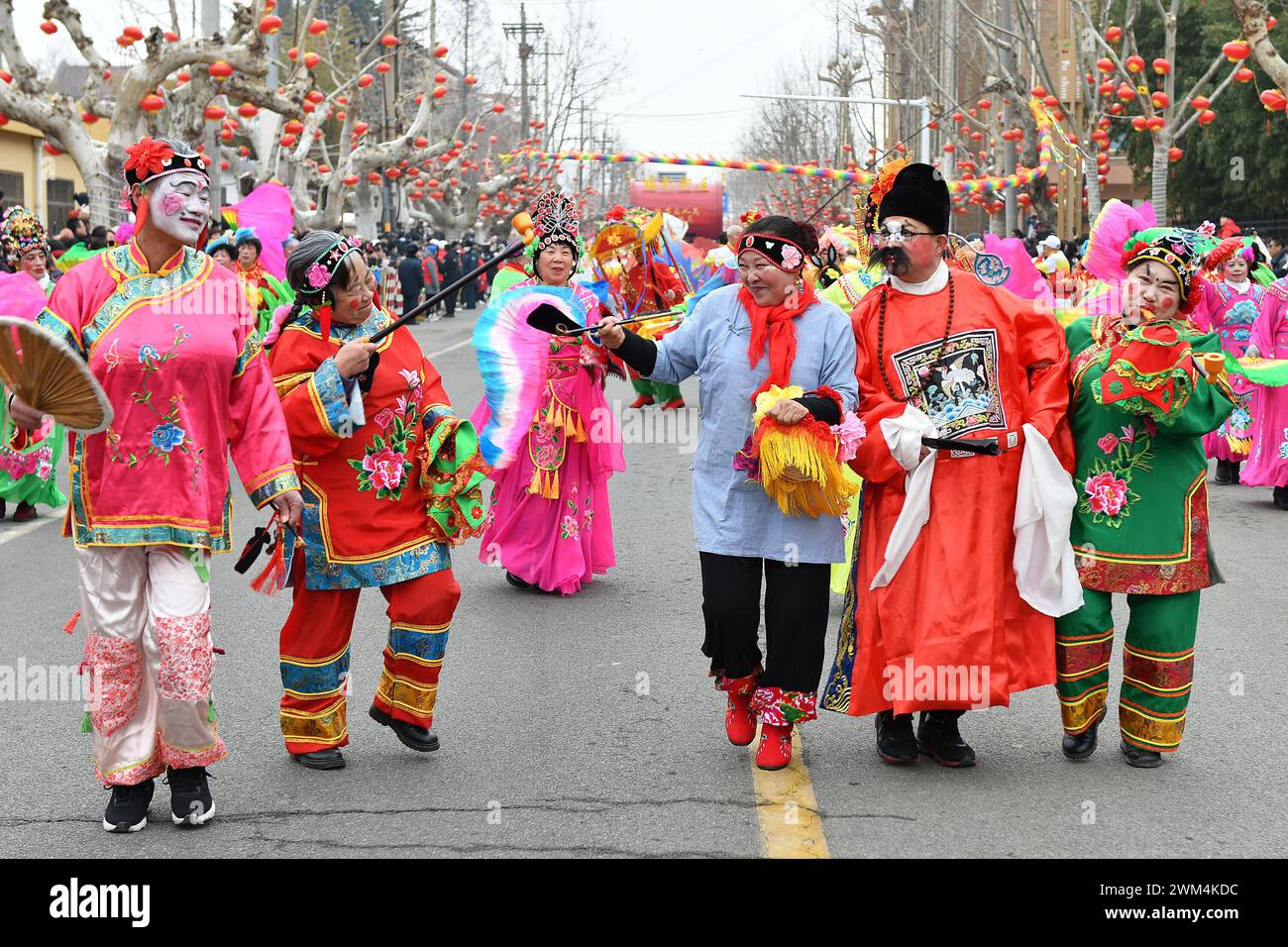 Yantai, China. 24th Feb, 2024. Folk artists are performing a folk show ...