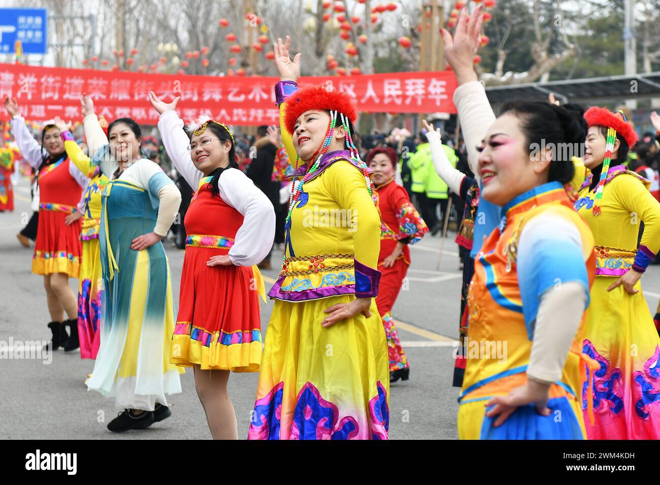 Yantai, China. 24th Feb, 2024. Folk artists are performing a folk show ...