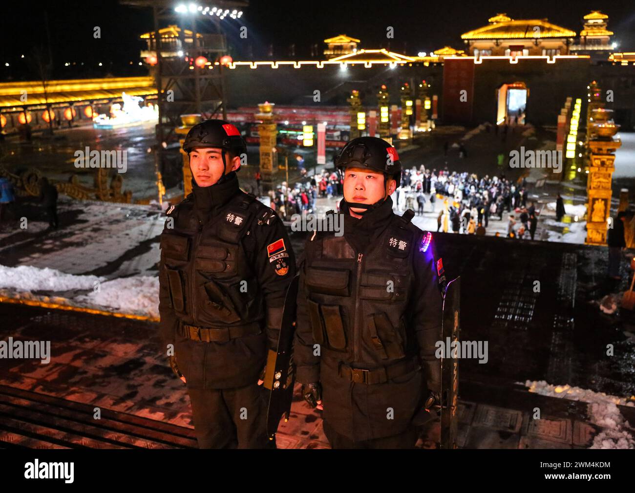 Linyi, China. 24th Feb, 2024. Police officers are on duty at the Tanguo ...