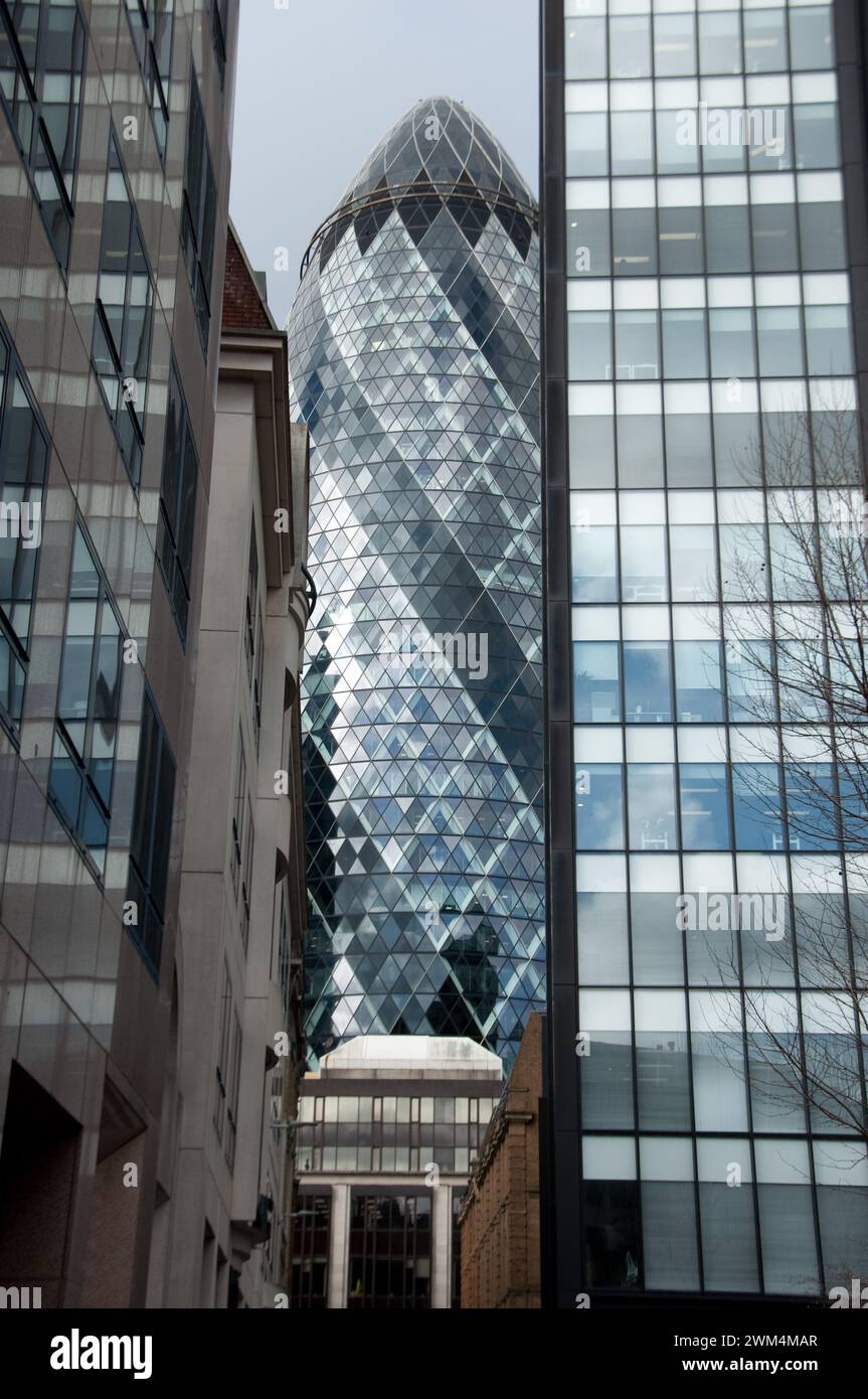 The gherkin among high rise buildings hi-res stock photography and ...