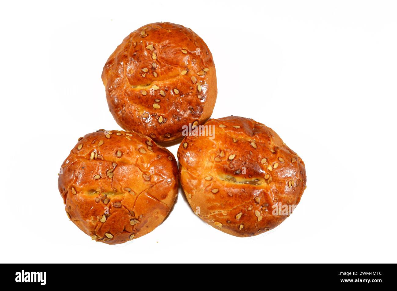 Pastry stuffed with Malban creamery and topped with sesame seeds ...