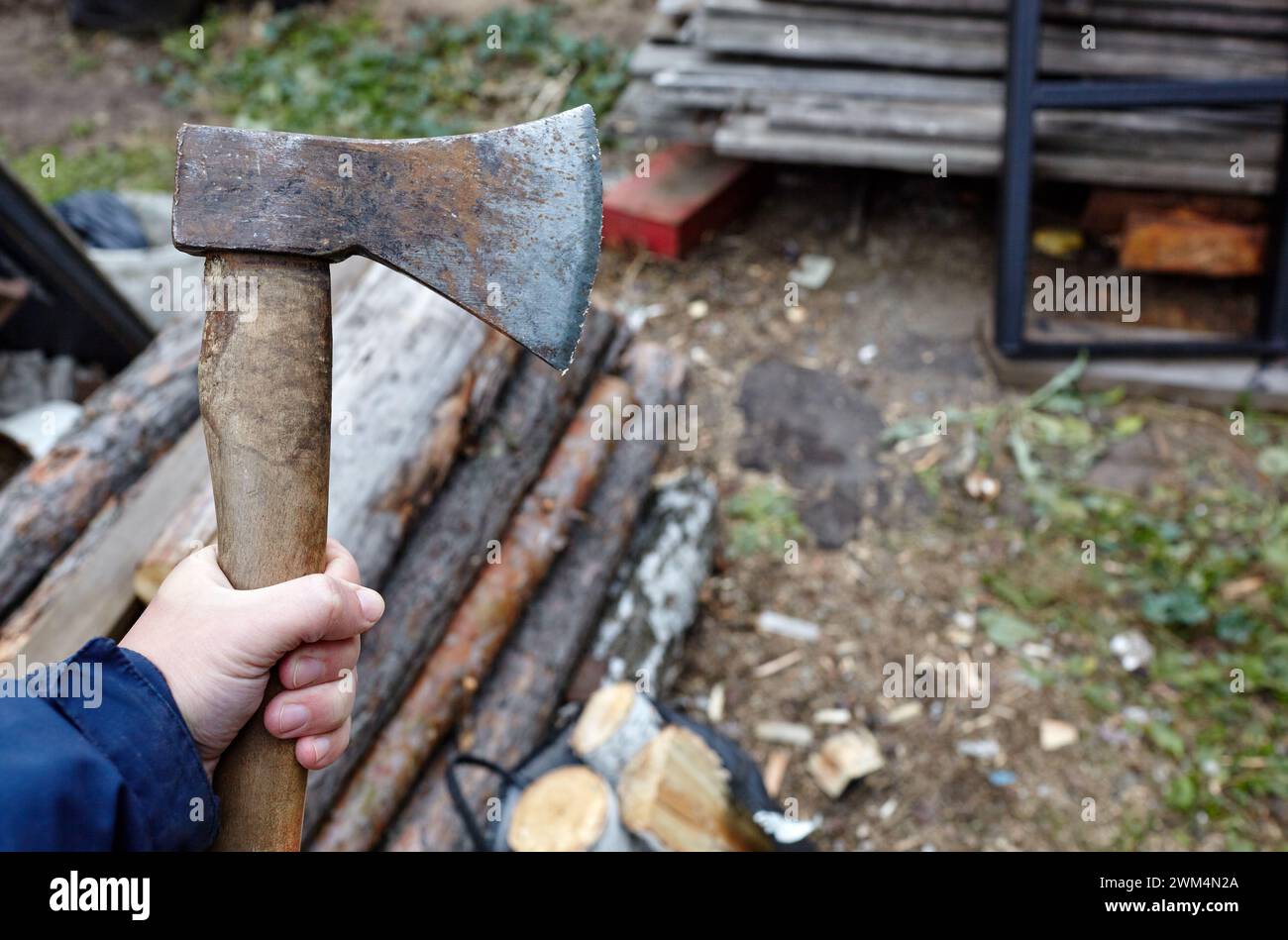 Man holding axe hi-res stock photography and images - Alamy