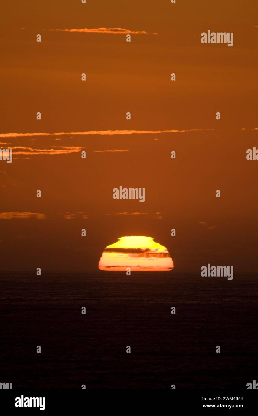 Sunsetting with clouds from the eastern horizon as seen from Barter Island 1002 coastal plain ...