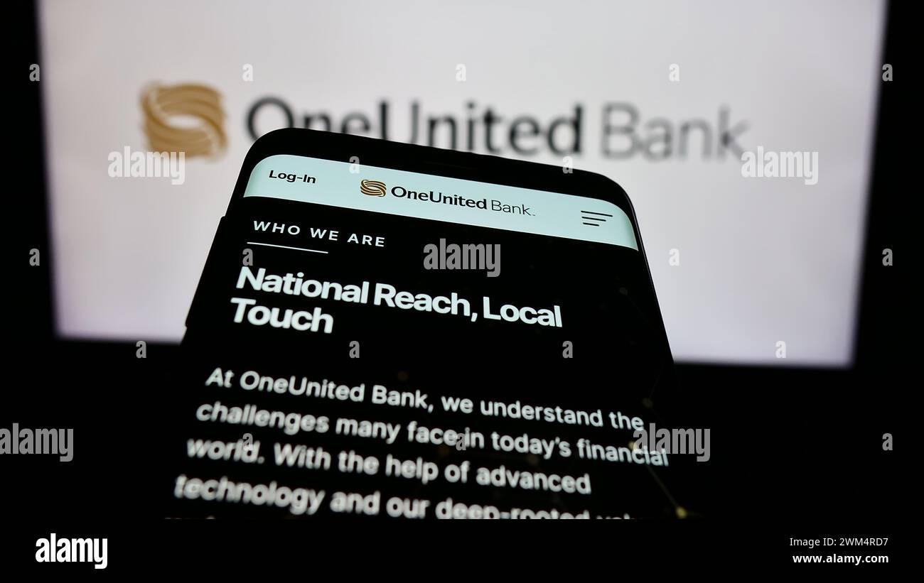 Mobile phone with website of US financial services company OneUnited ...