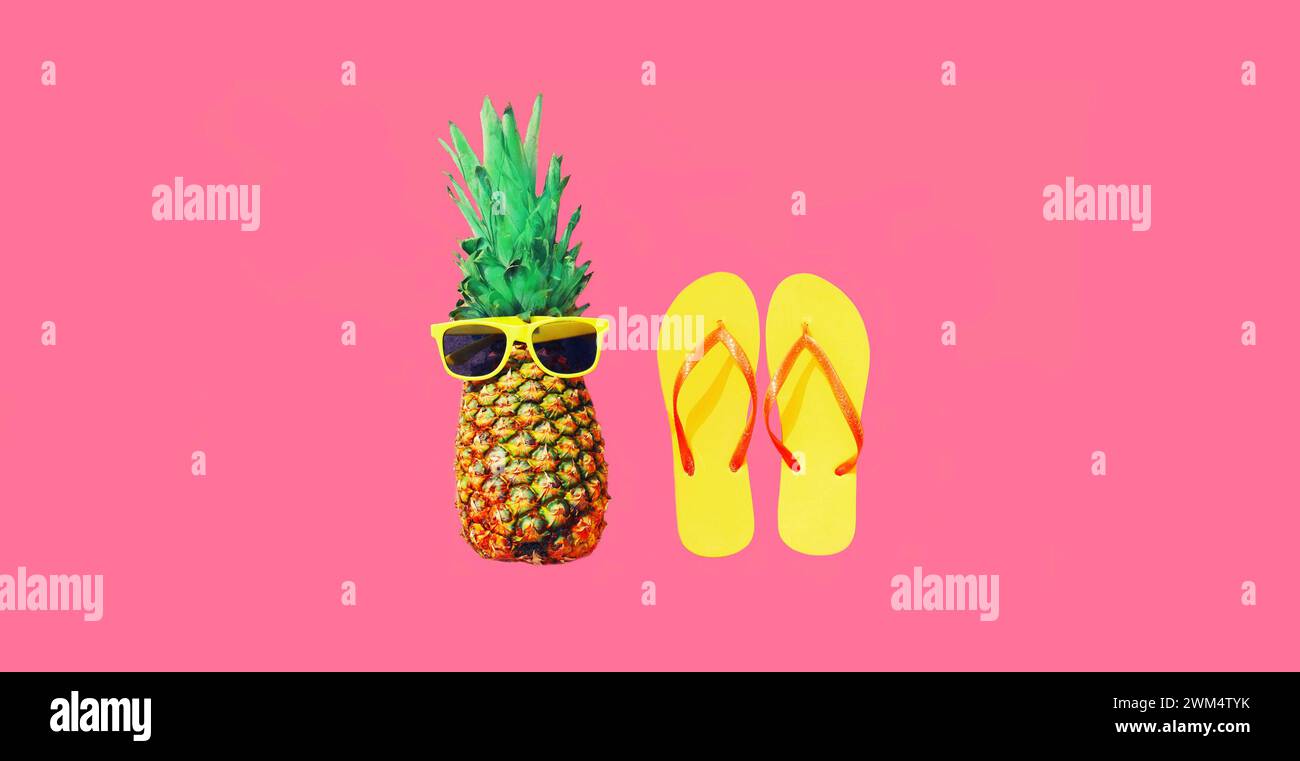 Summer vacation image, stylish pineapple and yellow flip flops on pink ...