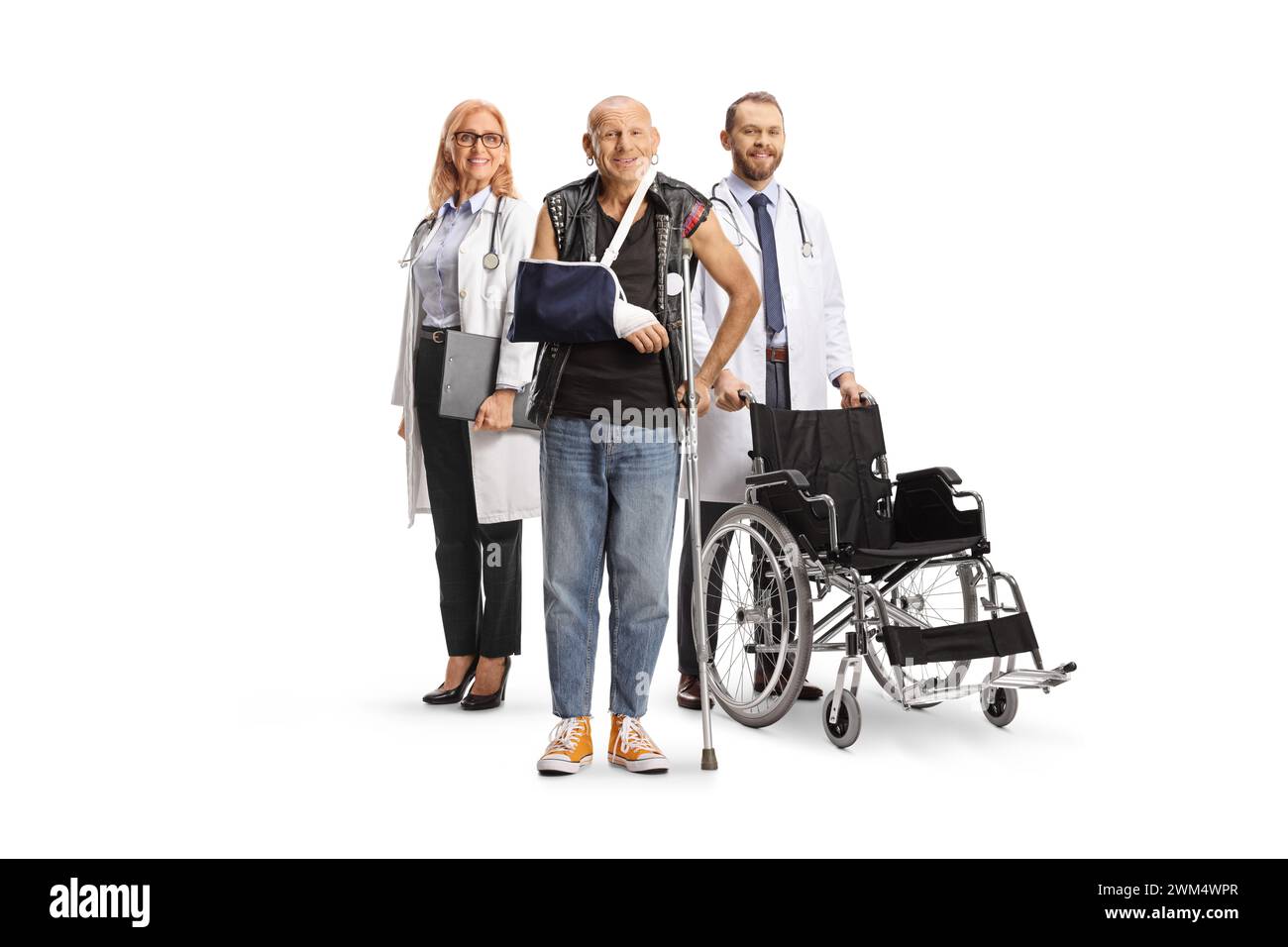 Injured man standing with a medical team isolated on white background ...