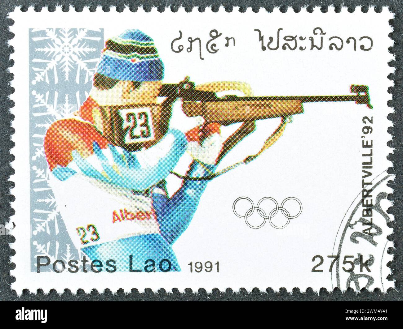 Cancelled postage stamp printed by Laos, that shows Biathlon, Winter ...