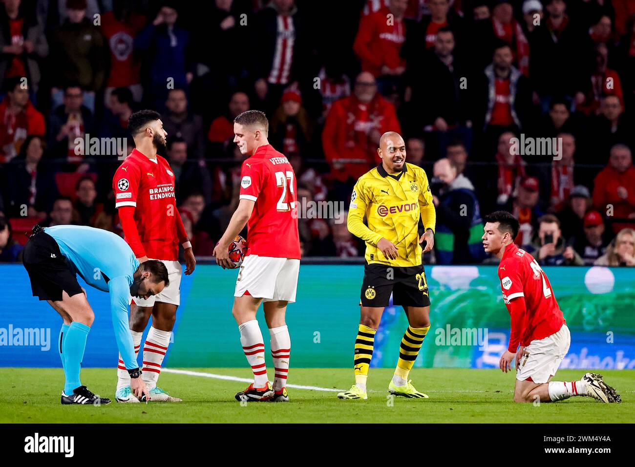 EINDHOVEN, NETHERLANDS - FEBRUARY 20: referee Srdjan Jovanovic, Ismael ...