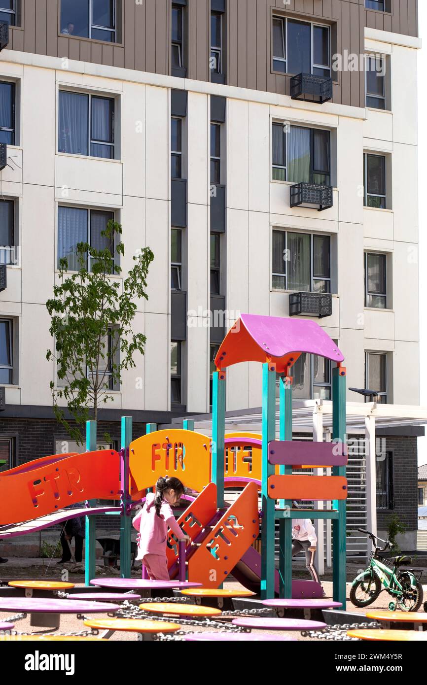 A vibrant playground with colorful equipment for kids, creating a fun ...