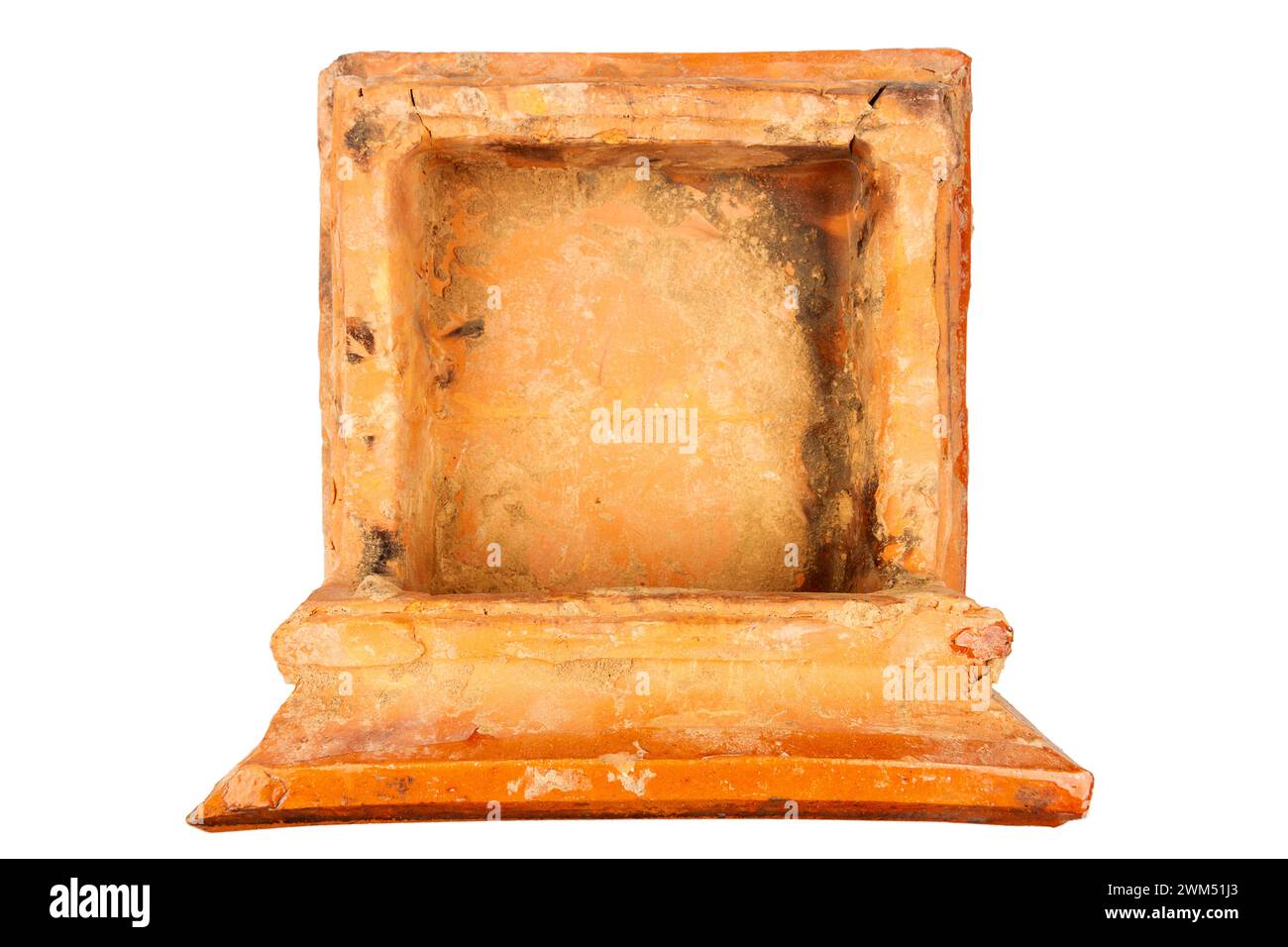 Old orange glazed furnace tile isolated on white background Stock Photo ...