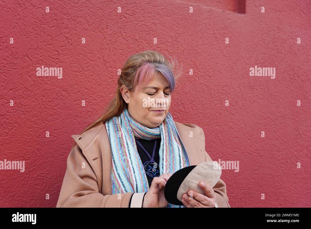 A nurse giving a class outside on medical supplies after colon cancer ...