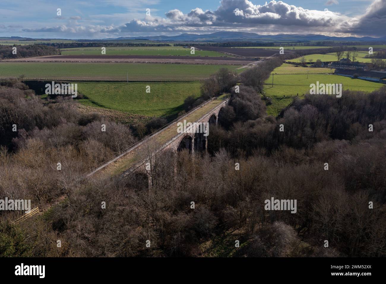 The disused railway viaduct crossing the Rutchey Burn near Norham which ...
