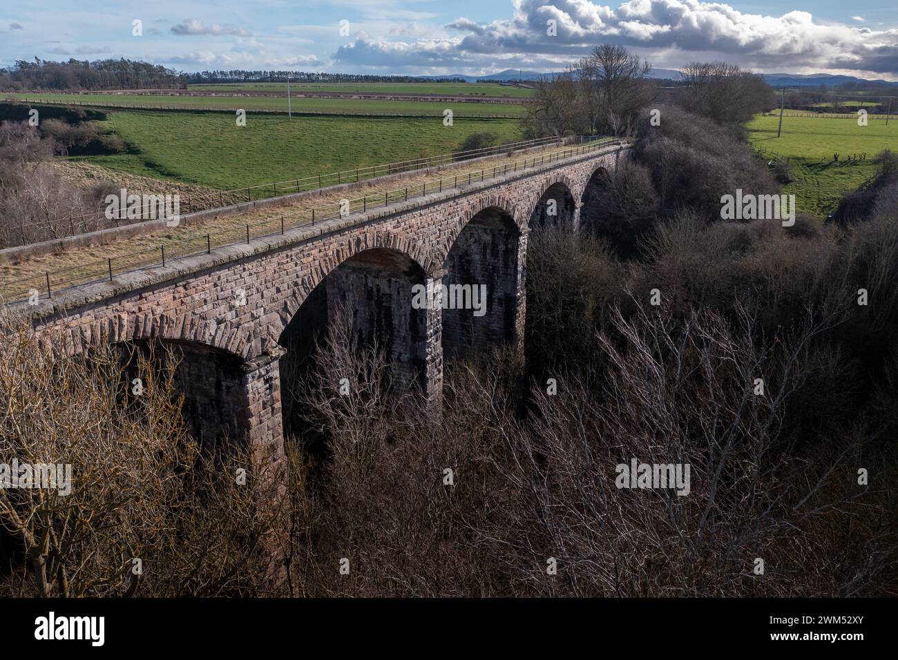 The disused railway viaduct crossing the Rutchey Burn near Norham which ...