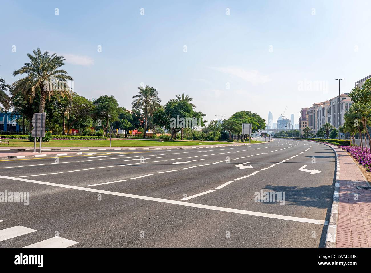 Road marking with direction arrow. Empty highway with white painted ...