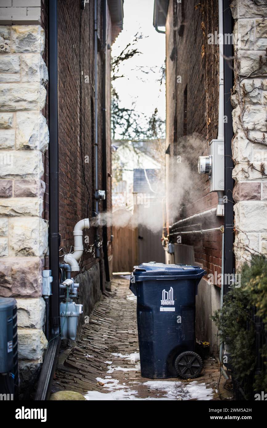 Toronto, Canada - Empty sidestreet in Toronto with garbage bin and ...