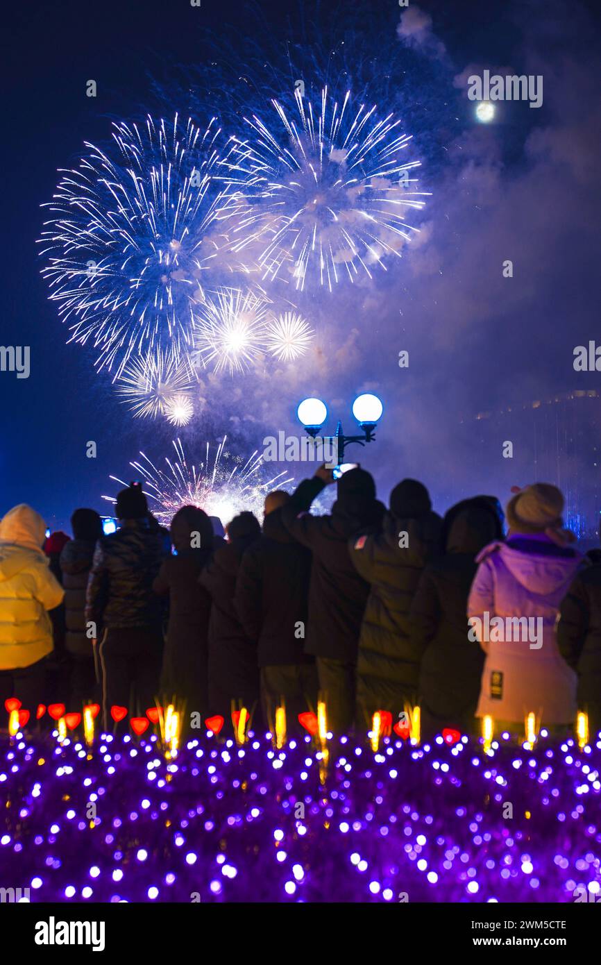 Beijing, China's Jilin Province. 24th Feb, 2024. Tourists enjoy ...