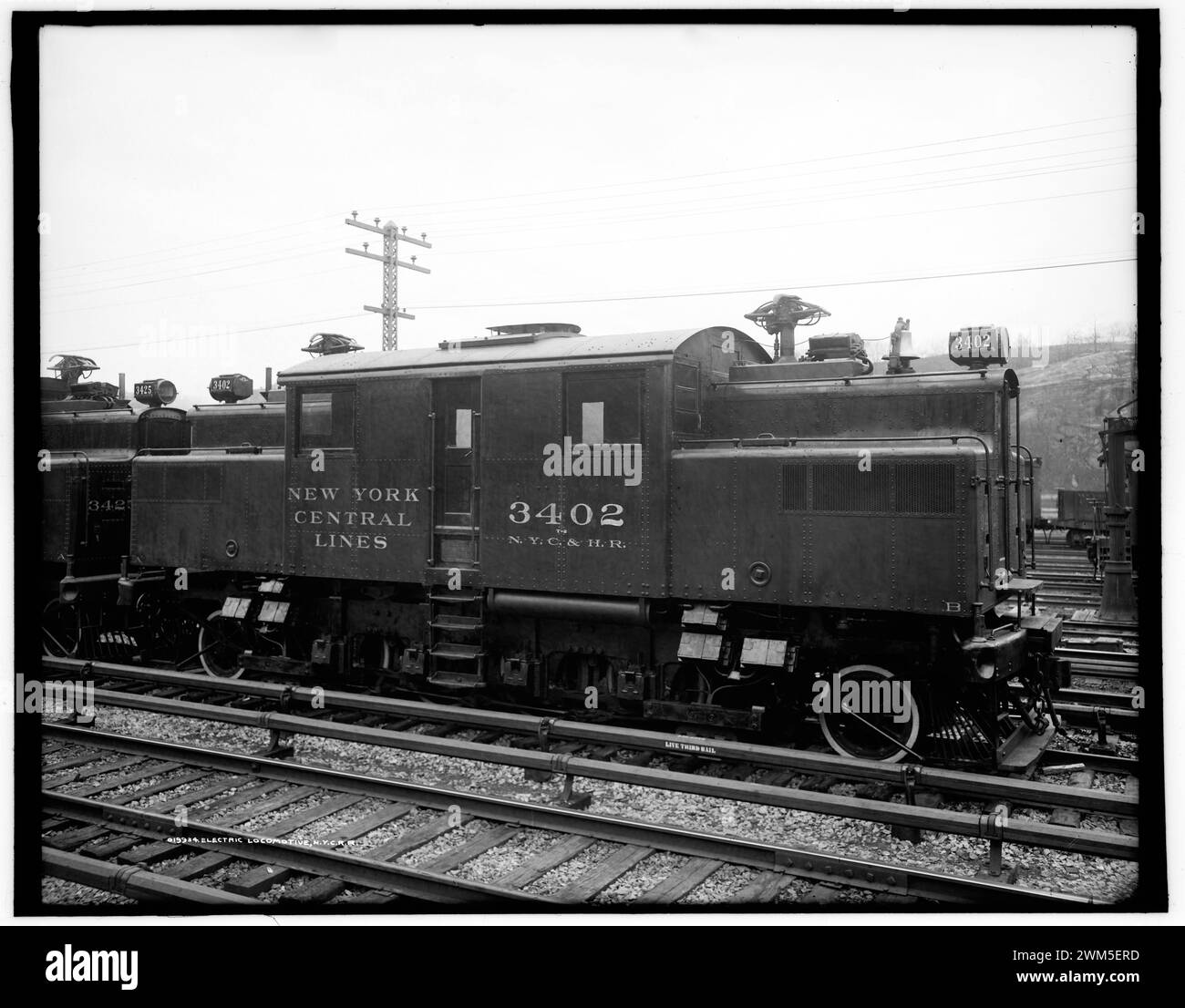 Steam train electric lines Black and White Stock Photos & Images - Alamy