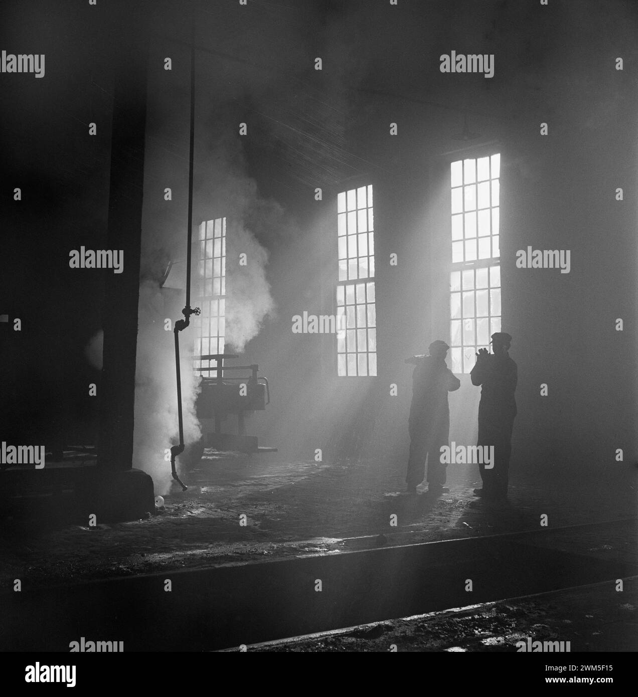 Train workers, locomotives - Chicago, Illinois. In the roundhouse at a Chicago and Northwestern ...