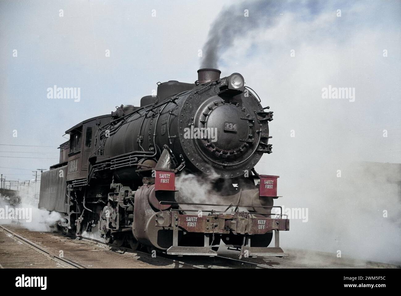 Locomotive in railroad yards along river, St. Louis, Missouri - Arthur ...
