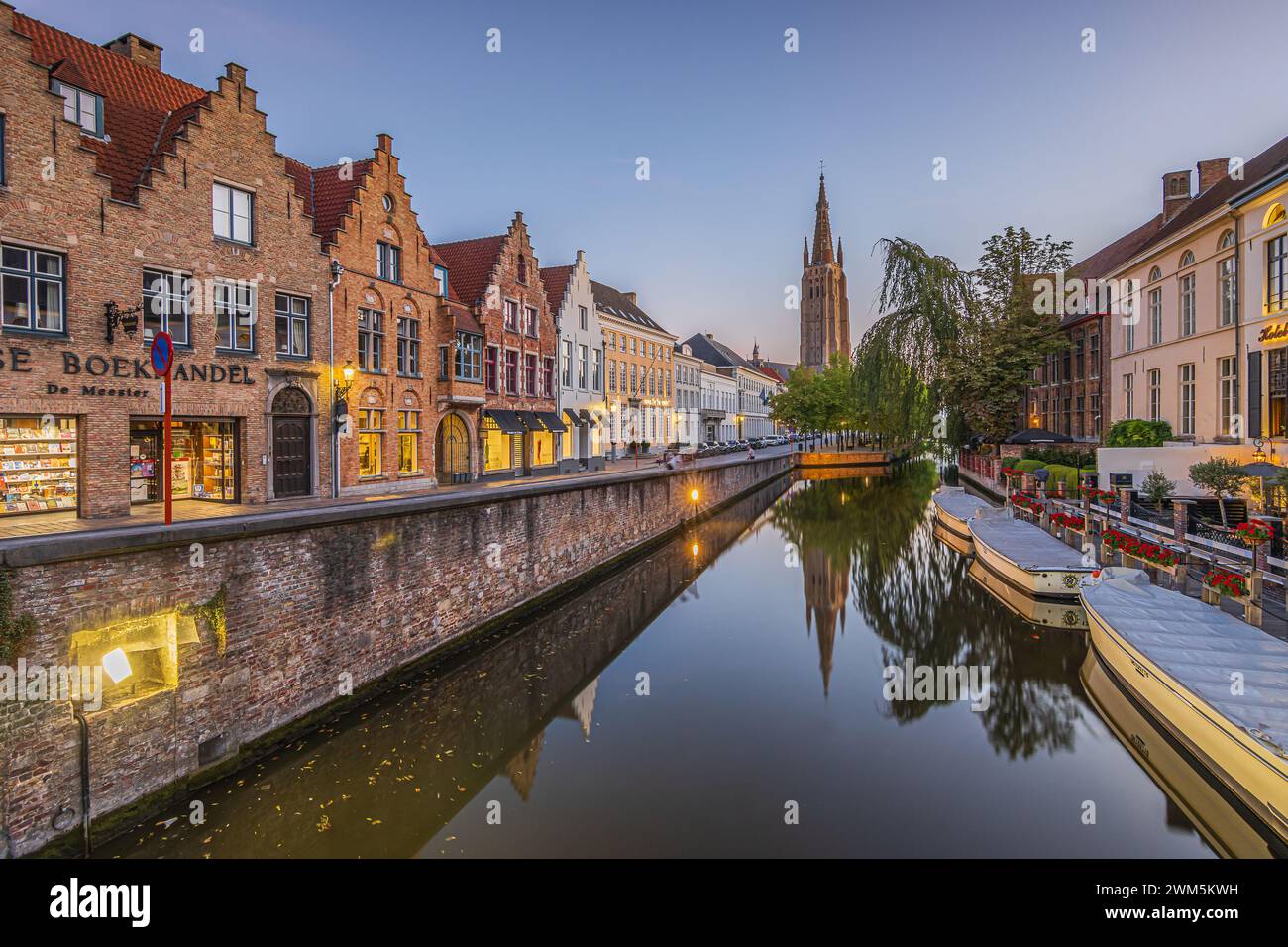 Old town of Bruges in the evening. Old houses and historic merchant ...