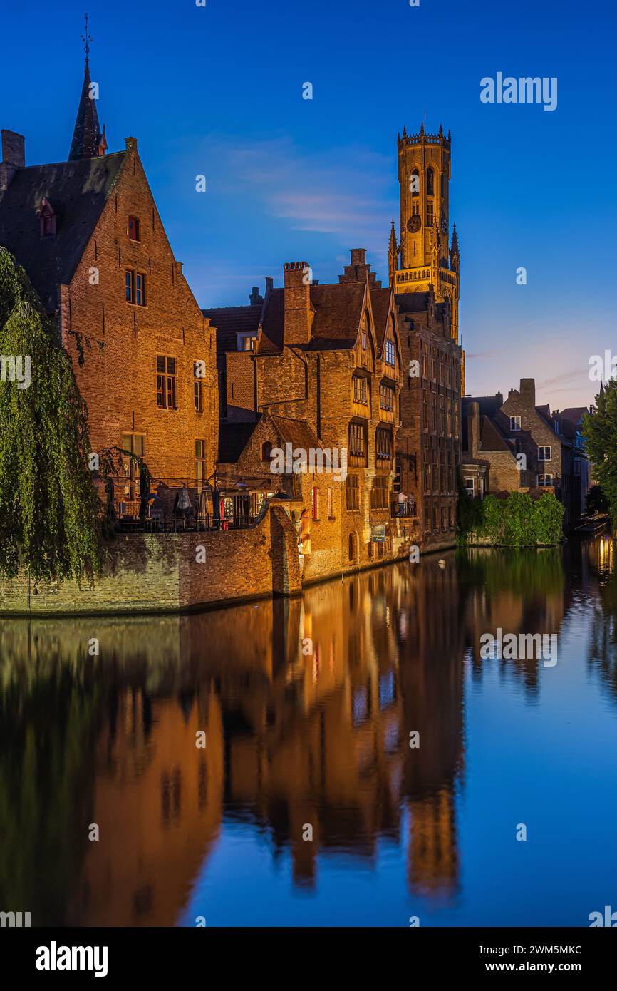 Belgian city of Bruges after sunset. Rosary Quay canal in the Hanseatic ...