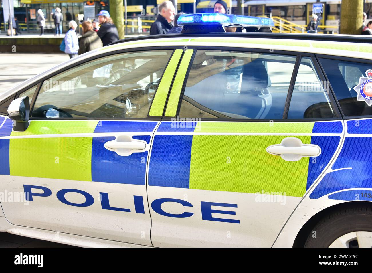 Police text on the side of a Greater Manchester police car in ...