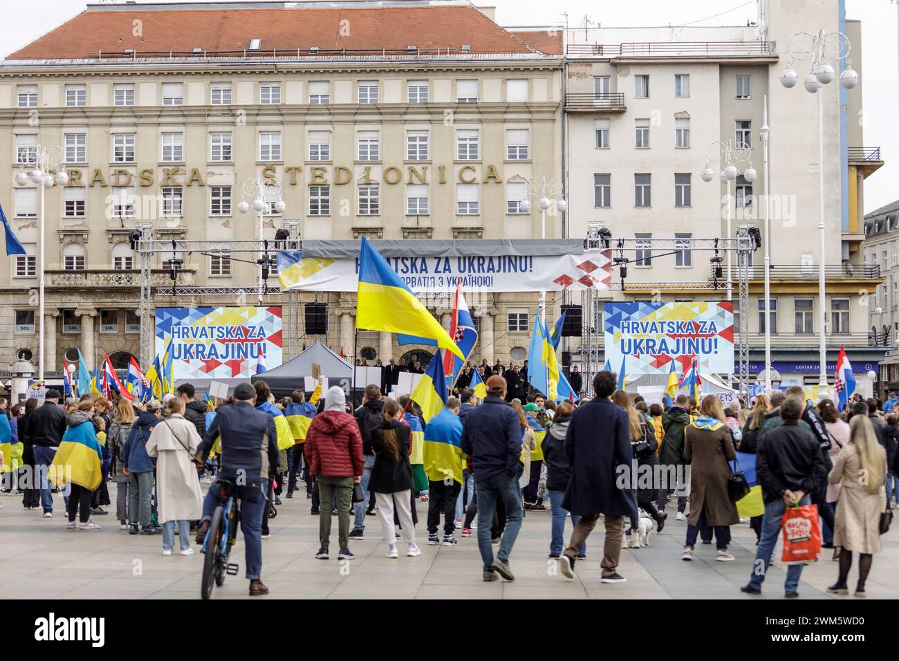 Members of the Ukrainian community and Croatian supporters take part in ...