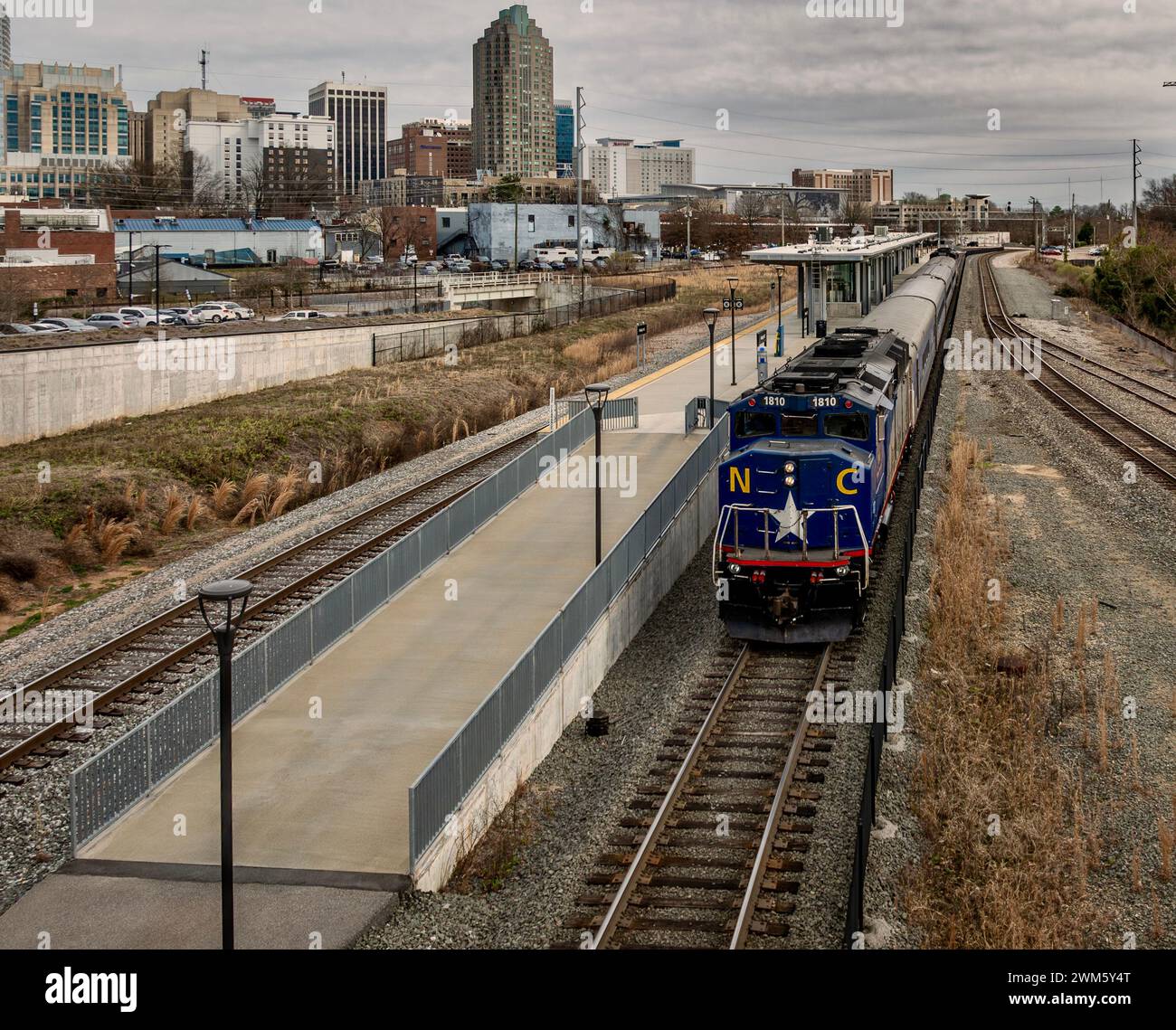 A blue train on the tracks. Boylan Bridge in Raleigh, North Carolina ...