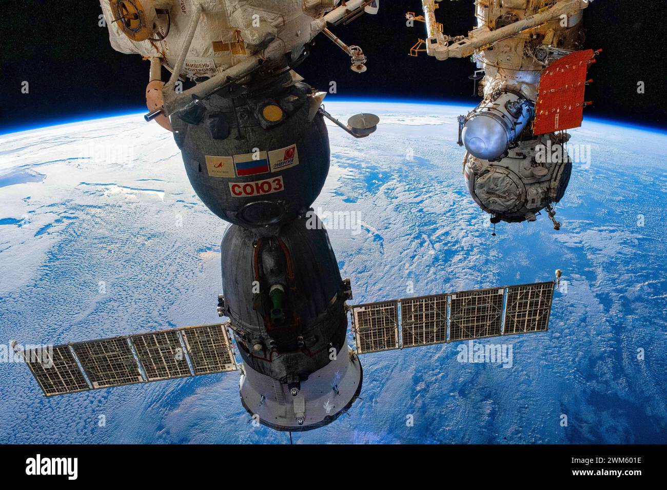 Soyuz spacecraft docked to the ISS. Digital enhancement of an image by ...