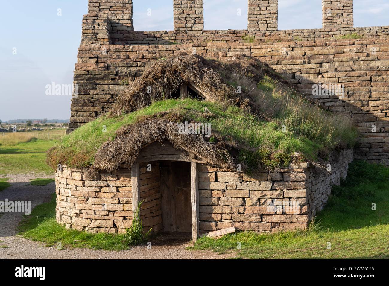 A stone hut with thatched roof covered in moss. Oland, Sweden Stock ...