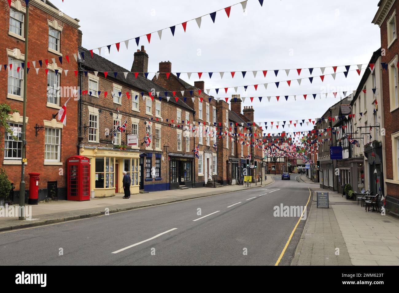 Flags along the Main Street of Ashbourne town; Peak District National ...