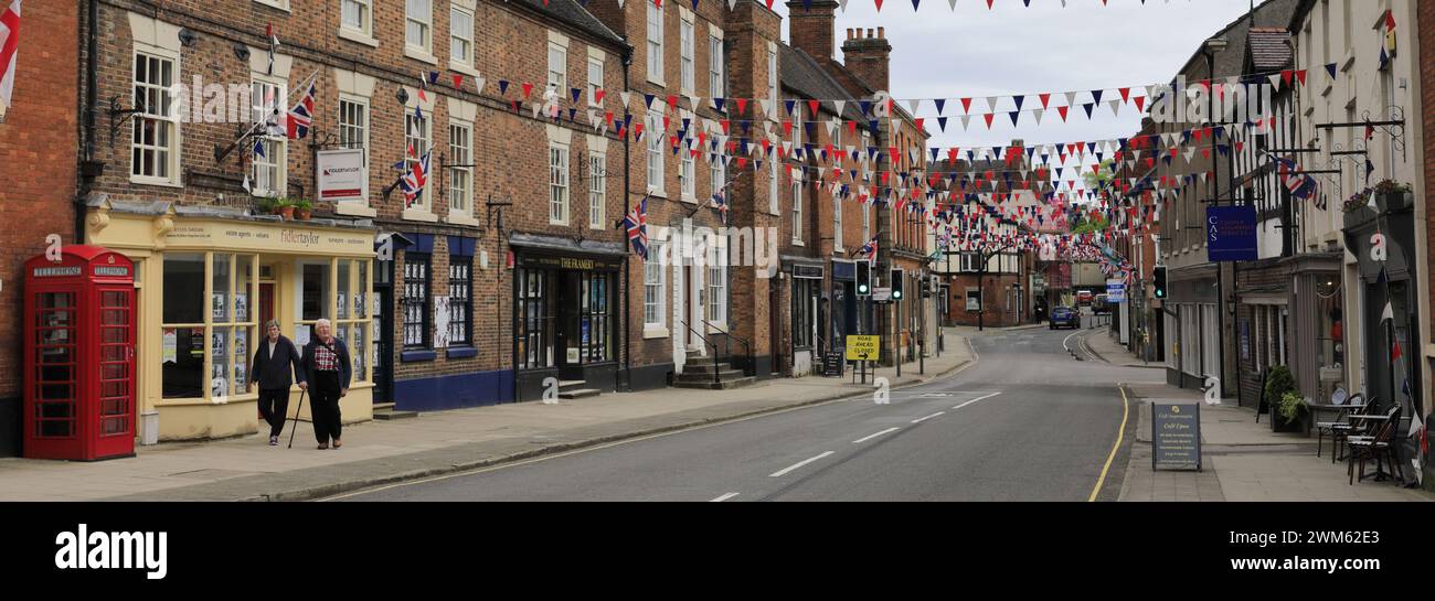 Flags along the Main Street of Ashbourne town; Peak District National ...