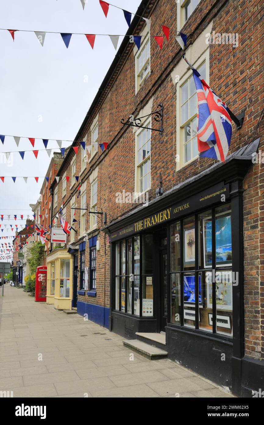 Flags along the Main Street of Ashbourne town; Peak District National ...