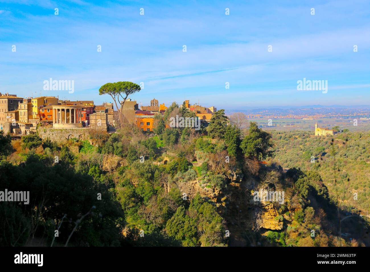 The scenic view of the hillside with green vegetation and Hadrian's ...